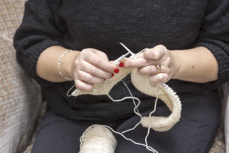 Knitting Needles with the Use of Wool Stock Photo - Image of material ...