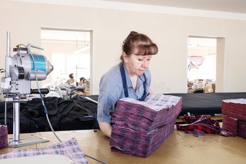 The Knitting Production, Cutter, Fabric, Seamstress Stock Photo - Image ...