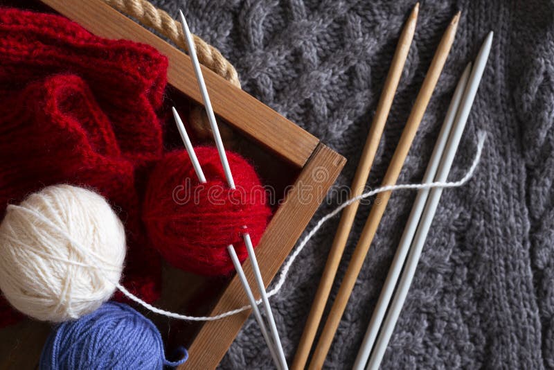 Knitting - Threads and Knitting Needles on a Wooden Table Stock Image ...