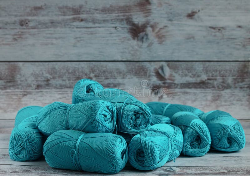 Blue Yarns for Knitting Handmade Clothes Lies on a Light Background ...