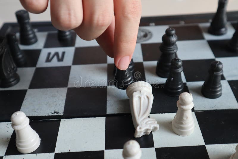 Knocking Down a Chess Piece while Playing a Chess Game at Home Stock ...