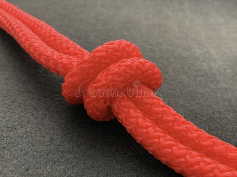 Bright Nylon Rope, on a Black Background. a Long Rope in a Bundle Stock ...