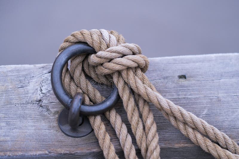Knot on a metal ring stock photo. Image of nautic, ship - 359987952