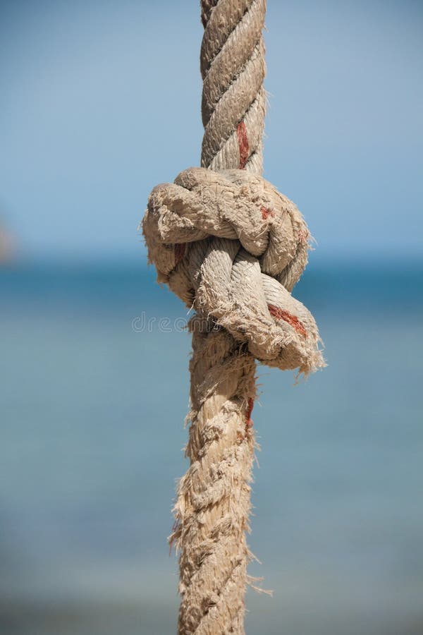 Knot on the rope and sea stock image. Image of cord, cable - 41228793