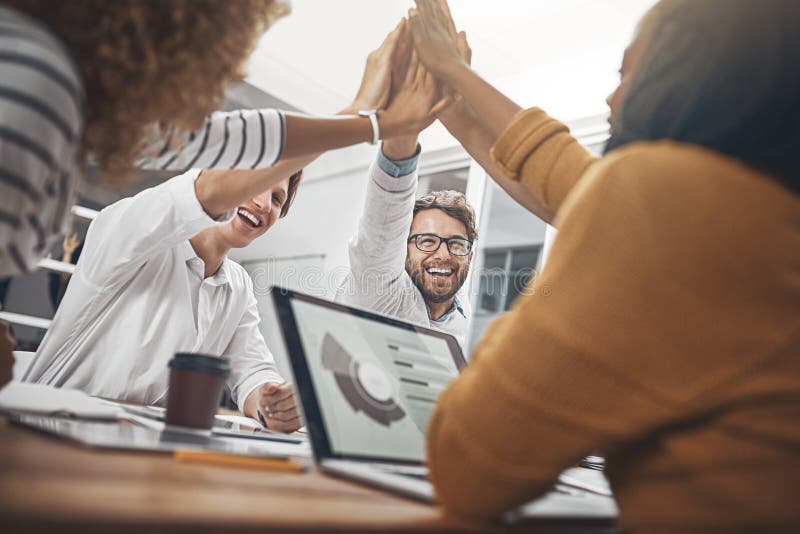 We Know we Can Depend on Each Other. Colleagues High-fiving in the ...