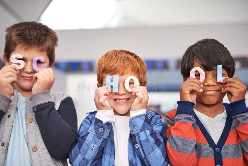 We Know Our Letters. Elementary School Children in Class. Stock Image ...