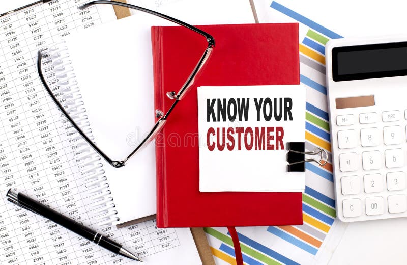 KNOW YOUR CUSTOMER Text on Notebook with Chart, Calculator and Pen ...