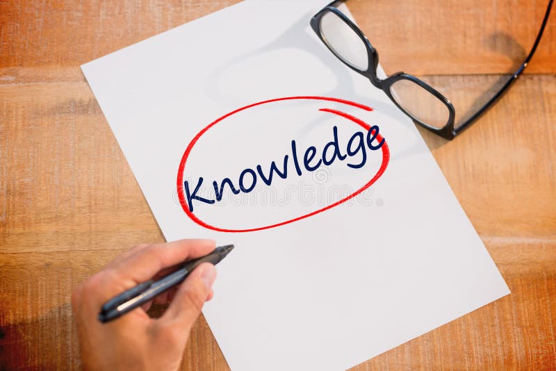 Knowledge Against Left Hand Writing on White Page on Working Desk Stock ...