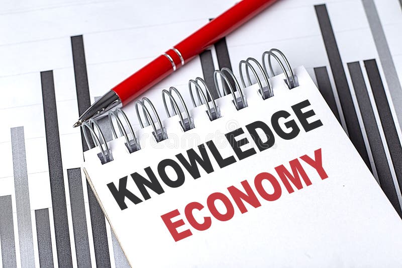 KNOWLEDGE ECONOMY Text on Notebook on Chart with Pen Stock Image ...