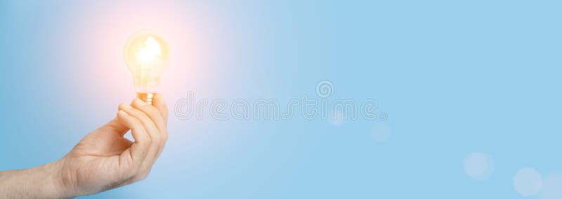 Knowledge and Idea Concept. Light Bulb with Light in Hand on a Blank ...