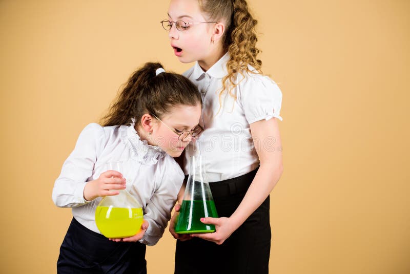 Fascinating Experiment. Knowledge Day. Schoolgirls Friends with ...