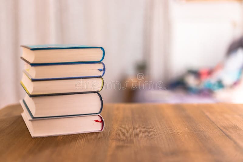 Knowledge and Science Concept: Stack of Books Lying on Wooden Desk ...