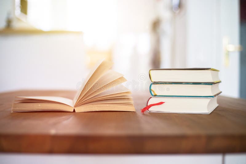 Knowledge and Science Concept: Stack of Books Lying on Wooden Desk ...