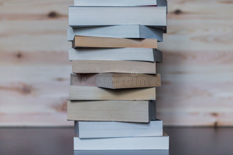 Knowledge and Science Concept: Stack of Books, Wooden Background Stock ...