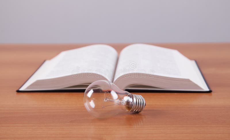 Knowledge and Wisdom, Light Bulb and Book Stock Photo - Image of open ...