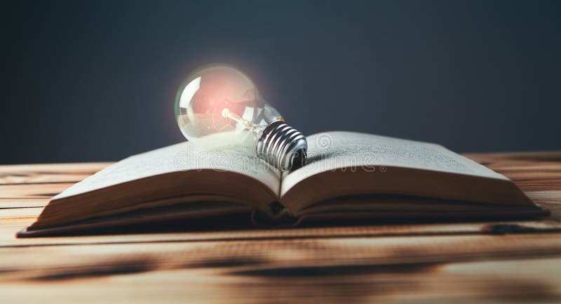 Knowledge and Wisdom, Light Bulb on the Book Stock Photo - Image of ...
