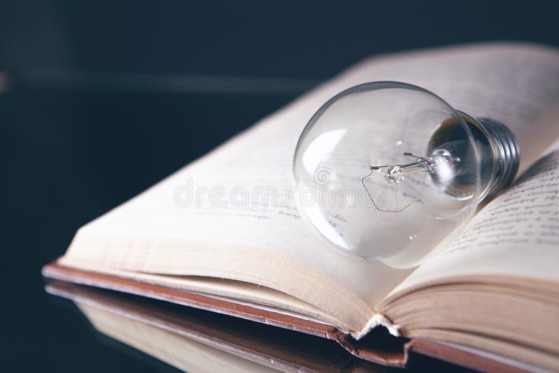 Knowledge and Wisdom, Light Bulb on the Book Stock Photo - Image of ...