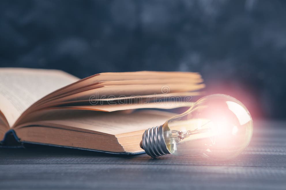 Knowledge and Wisdom, Light Bulb on the Book Stock Photo - Image of ...