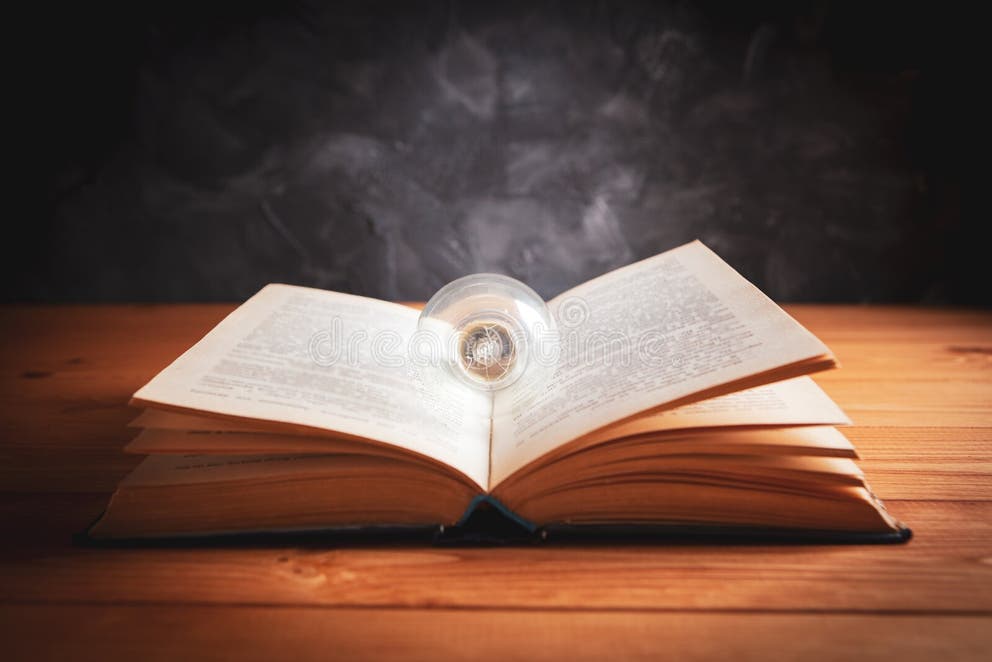 Knowledge and Wisdom, Light Bulb on the Book Stock Image - Image of ...