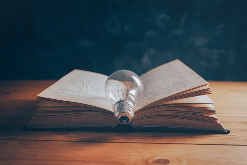 Knowledge and Wisdom, Light Bulb on the Book Stock Photo - Image of ...