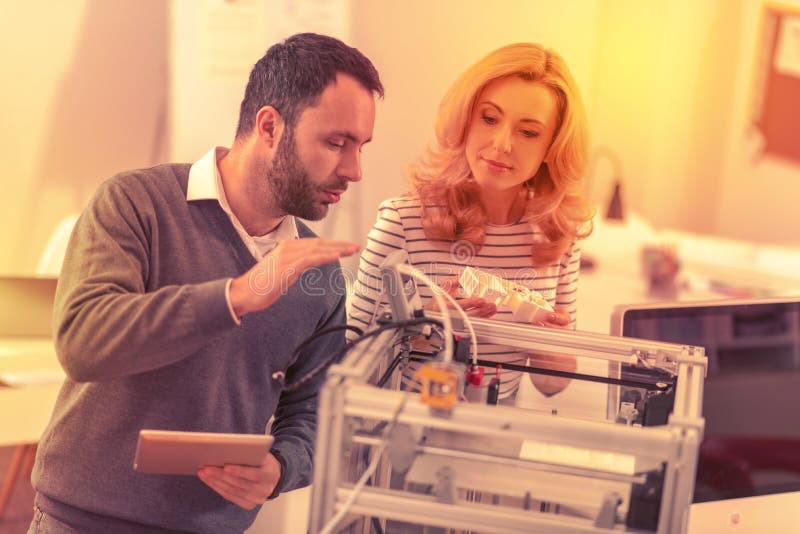 Knowledgeable Boss Giving His Assistant Helpful Instructions. Stock ...