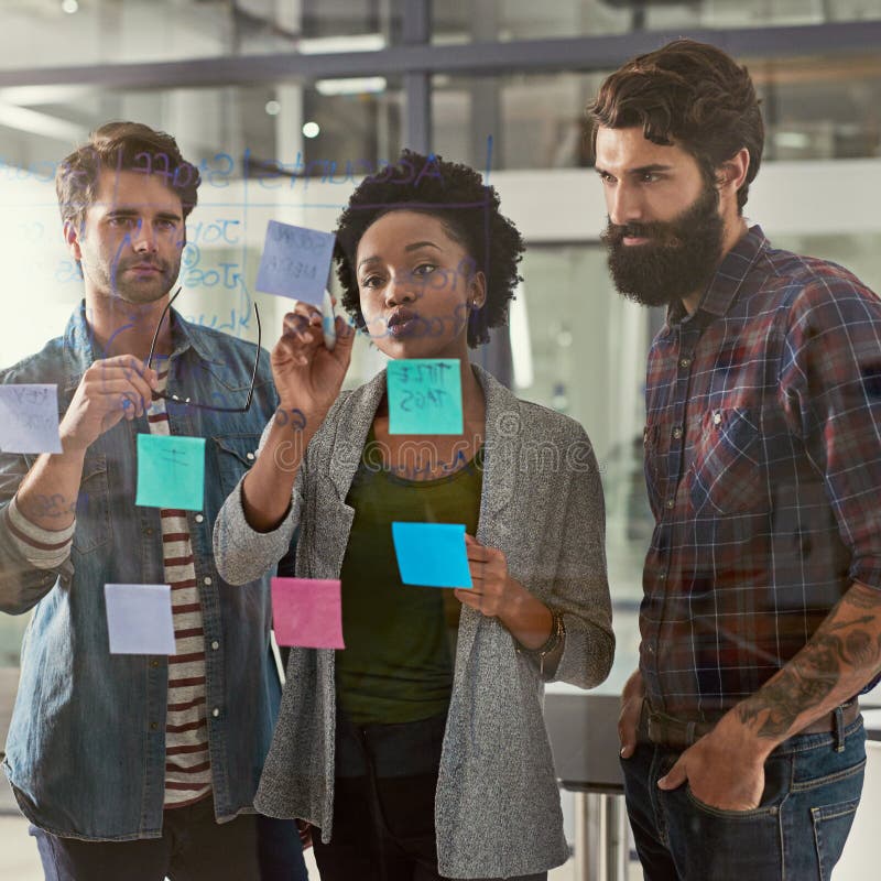 She Knows Exactly How To Solve this One. Creative Businesspeople Having ...