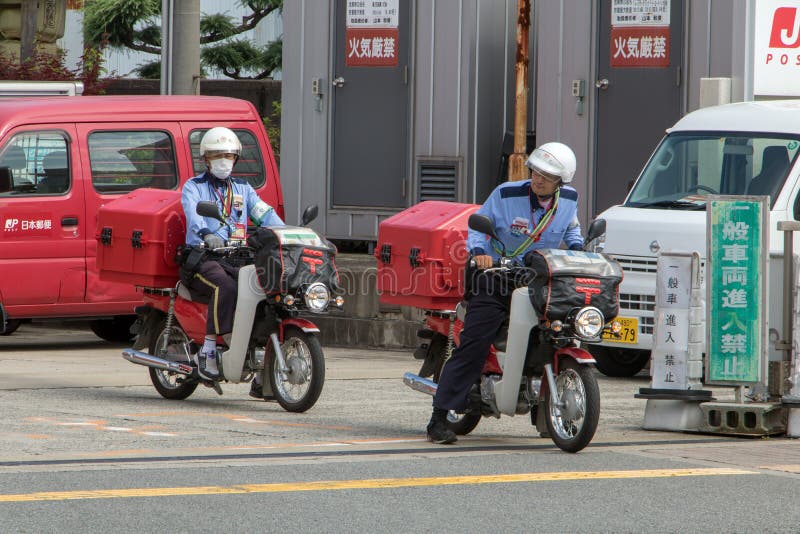 The Postmen on Motorcycles are Leaving the Post Office Editorial ...