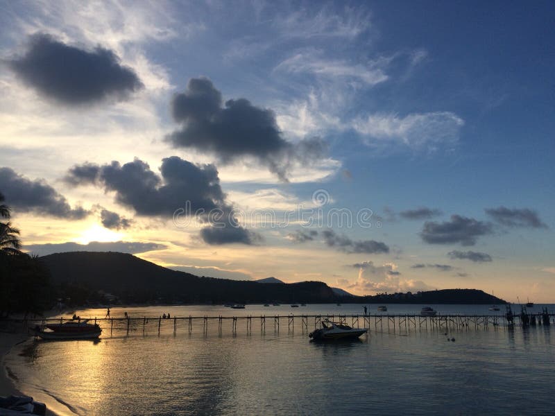 Sunset at pier stock photo. Image of pier, sunset, traveling - 113219376