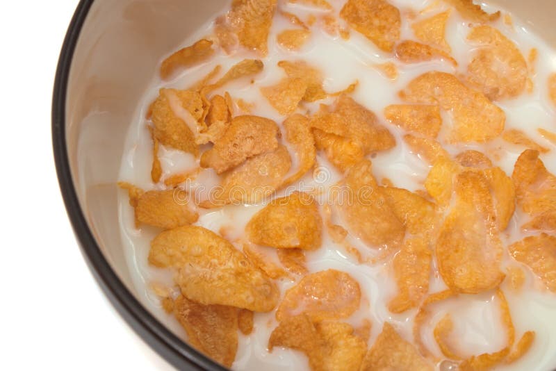 Kom met cornflakes en melk stock afbeelding. Image of vloeistof - 39505067