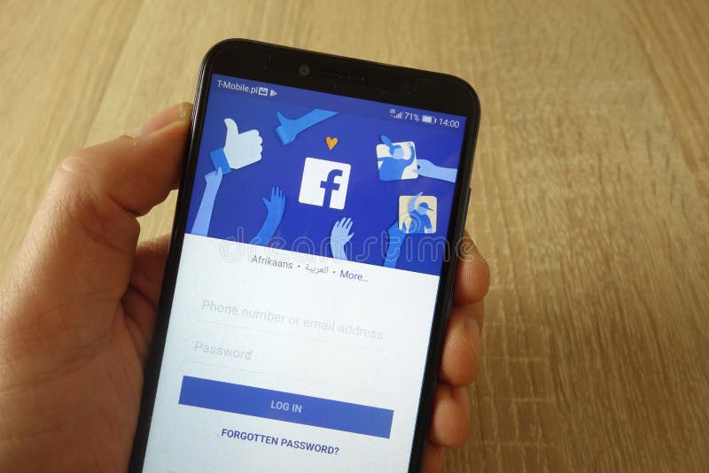 KONSKIE, POLAND - May 18, 2019: Hand Holding Smartphone with Facebook ...