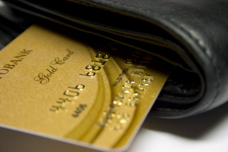 Med en kontokort i hand fotografering för bildbyråer. Bild av ...