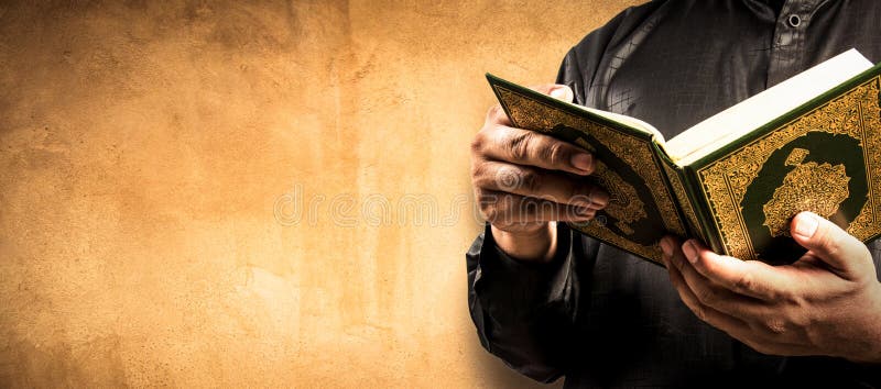 Koran in Hand - Holy Book of Muslims Stock Photo - Image of hand, holy ...