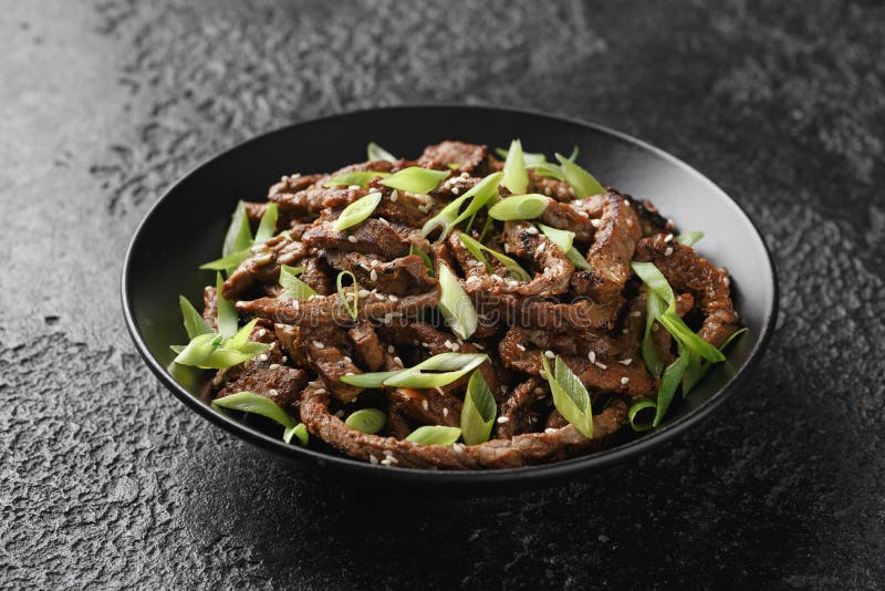 Korean Beef Bulgogi BBQ with Sesame Seeds and Spring Onion. Stock Image ...