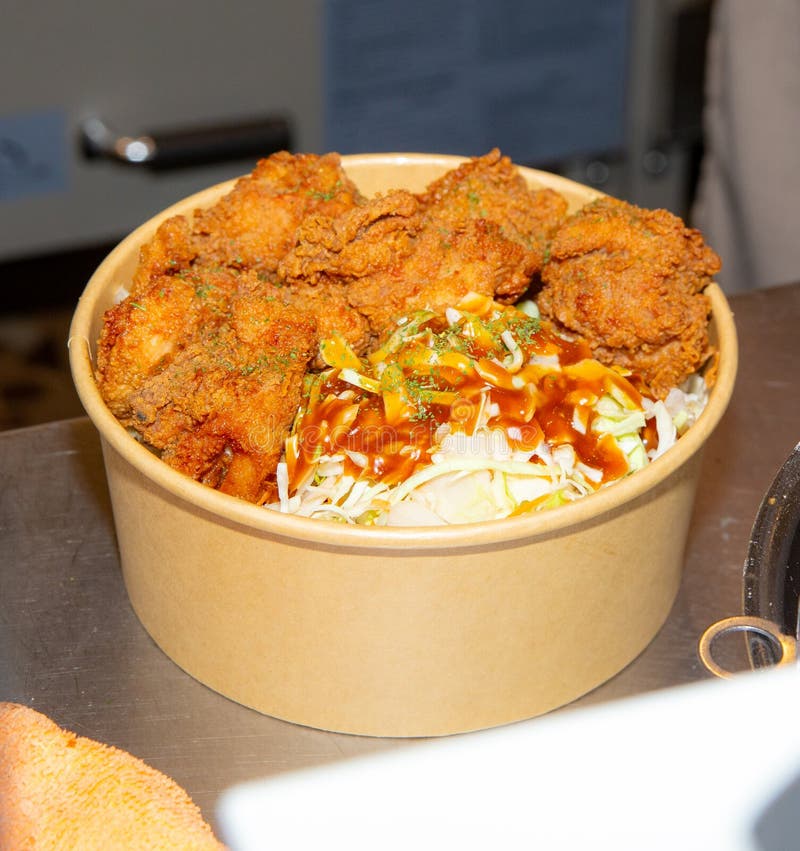 Korean Deep Fried Chicken on White Rice with Hot Spicy Sauce Stock ...