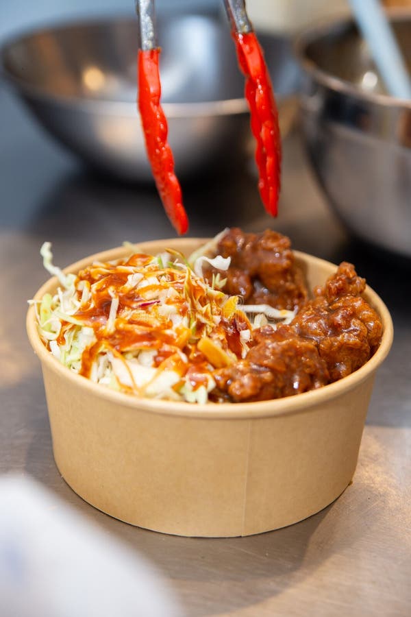 Korean Deep Fried Chicken on White Rice with Hot Spicy Sauce Stock ...