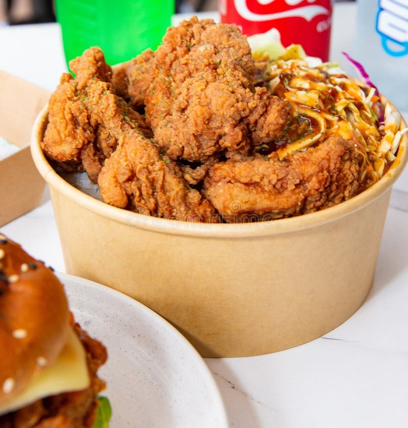 Korean Deep Fried Chicken on White Rice with Hot Spicy Sauce Stock ...