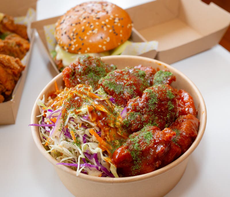 Korean Deep-fried Chicken on White Rice with Hot Spicy Sauce Stock ...