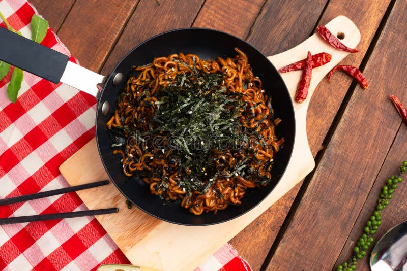 Korean Hot Spicy Noodles on Red Stock Image - Image of leaf, noodles ...
