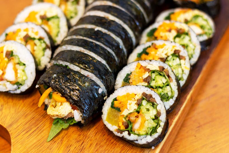 Korean Kimpab Rolls with Vegetables and Chicken on Board, Side View ...