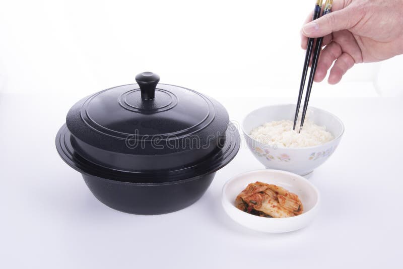 Korean Rice Pot and Bowl of Rice. Stock Photo - Image of korean, eatery ...