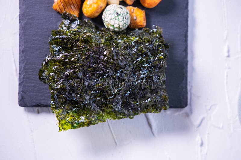 Korean Seaweed Chips on a Slate Plate. Asian Snack. Top View Stock ...