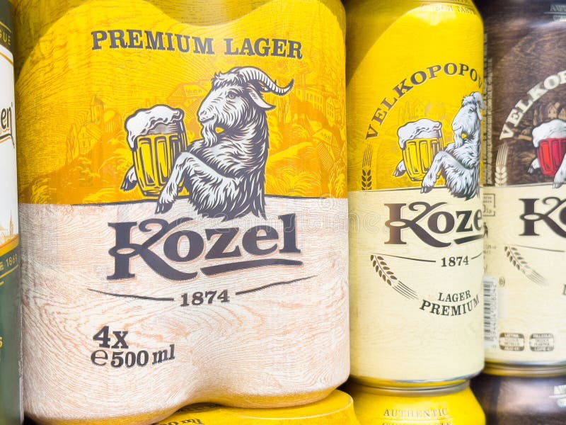 Kozel Lager Beer Cans Display with Goat Logo and Premium Branding ...