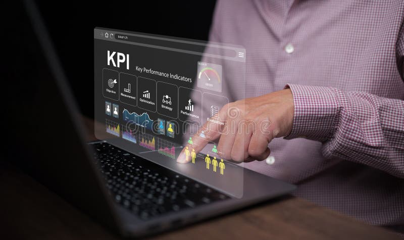 KPI Key Performance Indicator. a Businessman with a Notebook Computer ...
