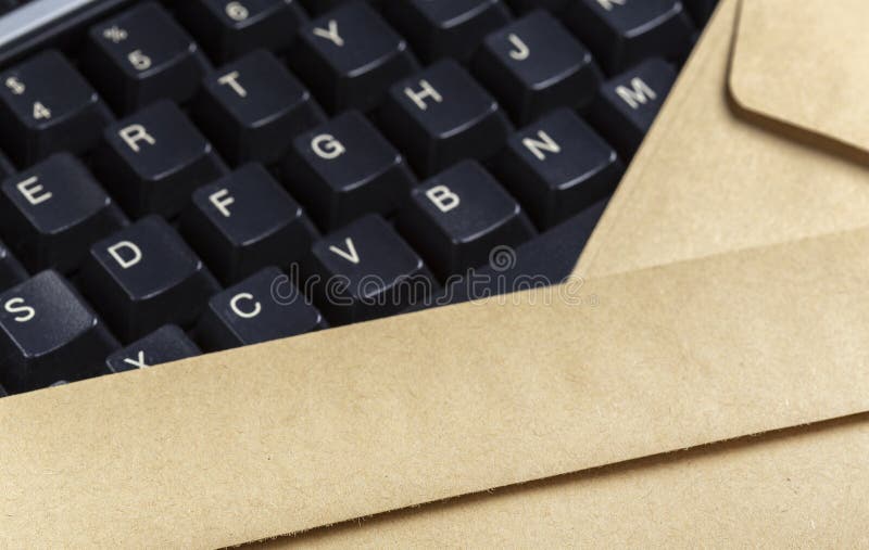 Kraft Paper Envelopes and Emails with Computer Keyboard Stock Photo ...