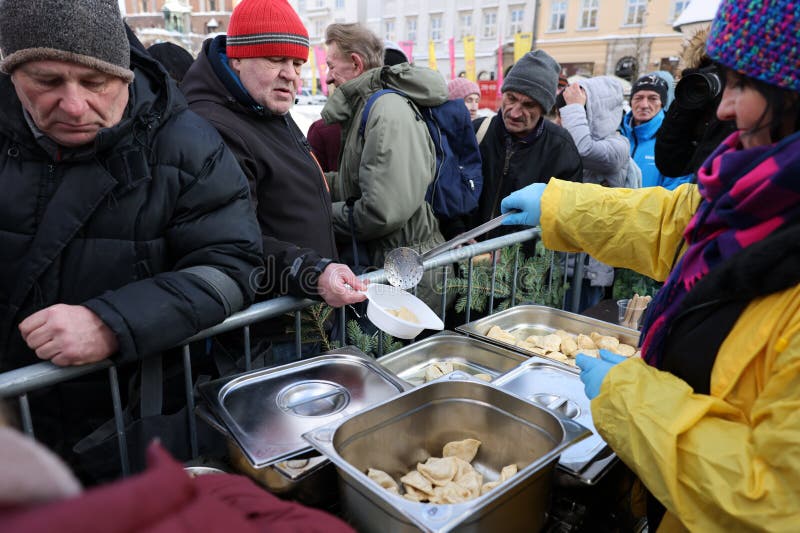 Christmas Eve for Poor and Homeless on the Main Square in Cracow ... Christmas Eve for Poor and Homeless on the Main Square in Cracow ...