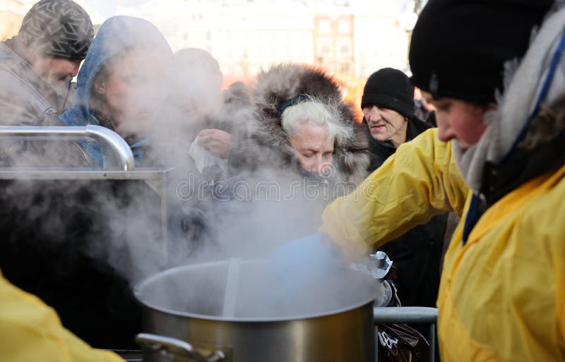 Christmas Eve for Poor and Homeless on the Main Square in Cracow ... Christmas Eve for Poor and Homeless on the Main Square in Cracow ...