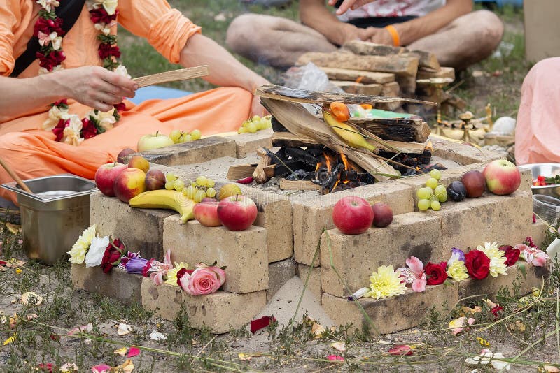 Krishnaids with Fruit by the Fire during the Ritual Stock Photo - Image ...