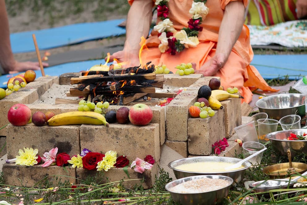 Krishnaids with Fruit by the Fire during the Ritual Stock Image - Image ...