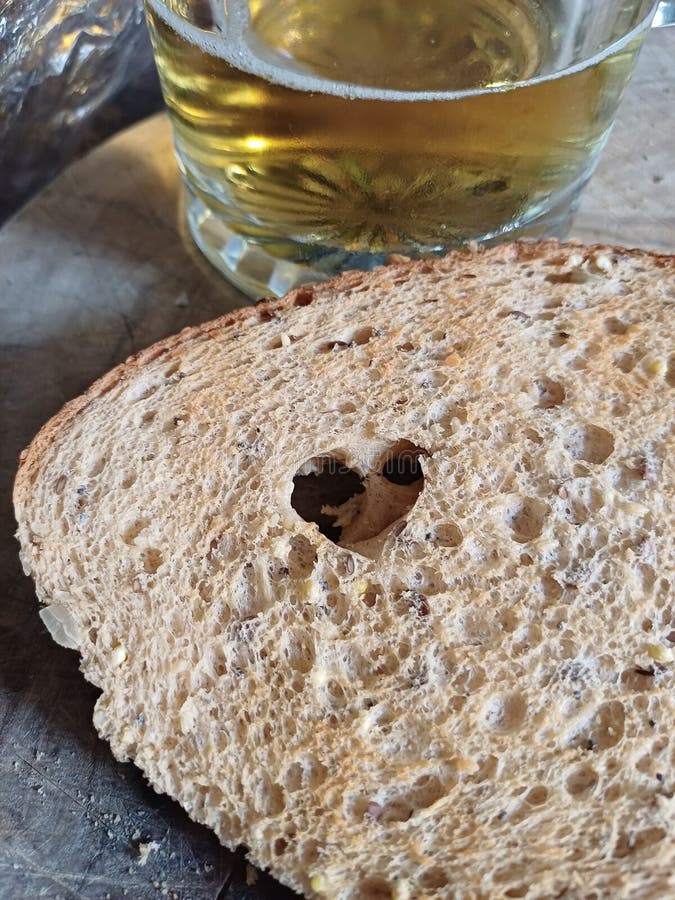 Krusty Bread with a Hard Shape and a Pint of Lager in the Background ...