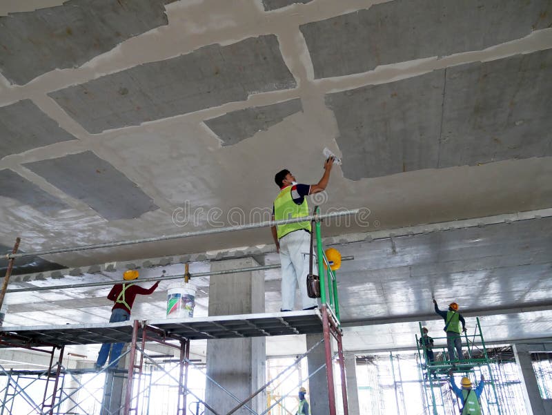 Construction Site Workers are Doing Ceiling Soffit Skim Coat Work at ...